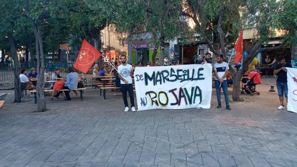 ANF | Activists in Europe commemorate the Rojava Revolution