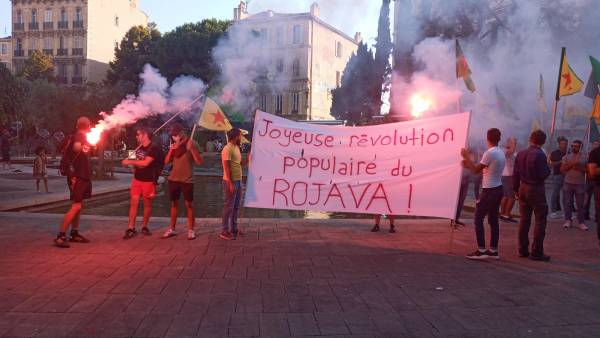 ANF | Activists in Europe commemorate the Rojava Revolution